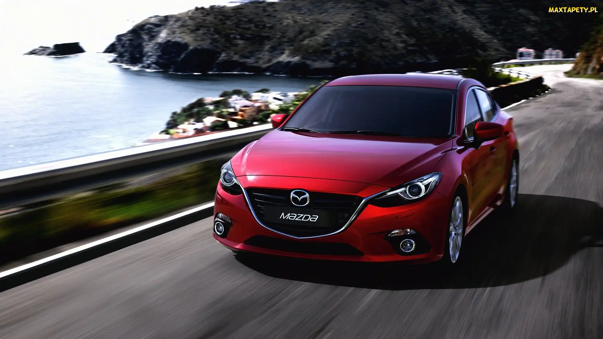 Tapety, zdjęcia - Mazda 3, Skały, Morze, Droga Tapety, zdjęcia - Mazda 3, Skały, Morze, Droga